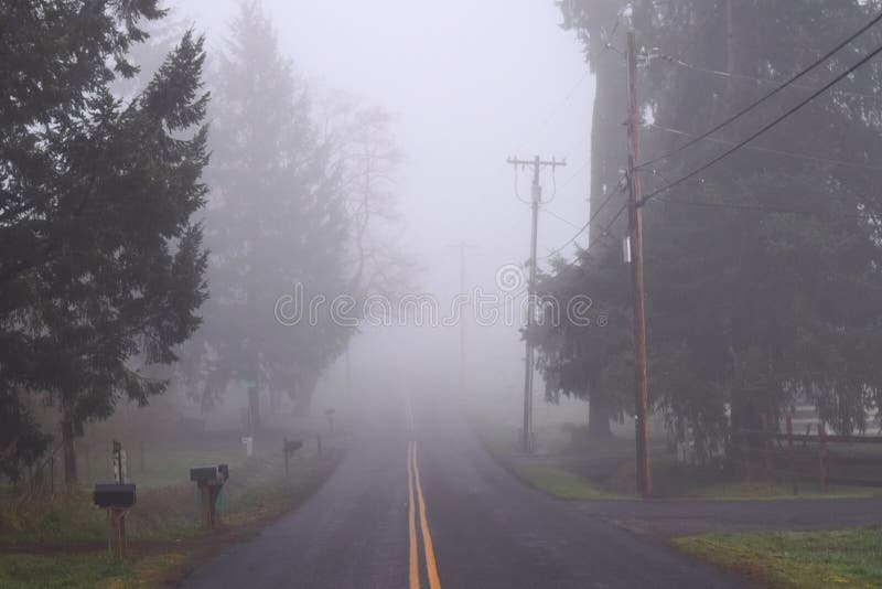 Road receding into fog stock photo. Image of thick, distance - 48758754