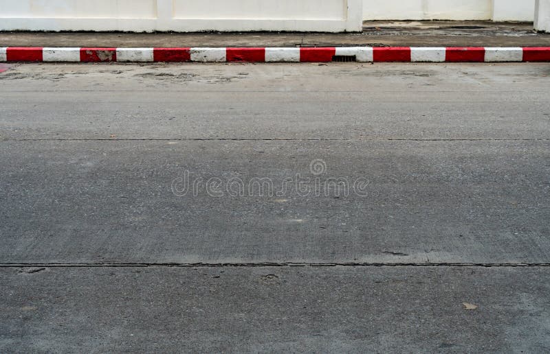 Road with Red and White Curb Stock Photo - Image of driveway, curb ...