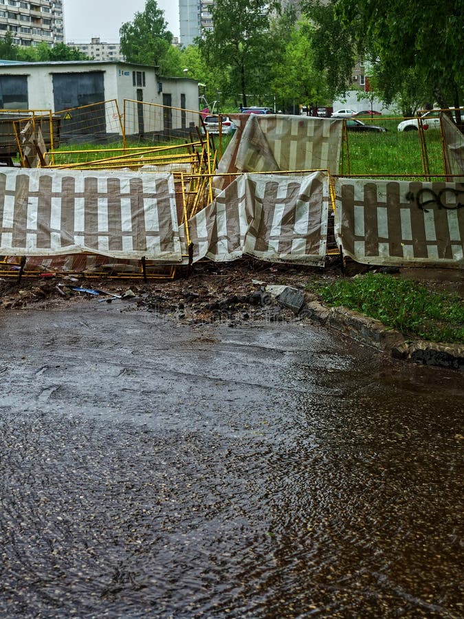 The Road Repair Fence Fell from the Wind Stock Image - Image of ...