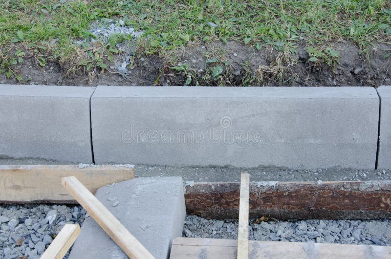 Road Repair. Installation of Road Borders Stock Image - Image of ...