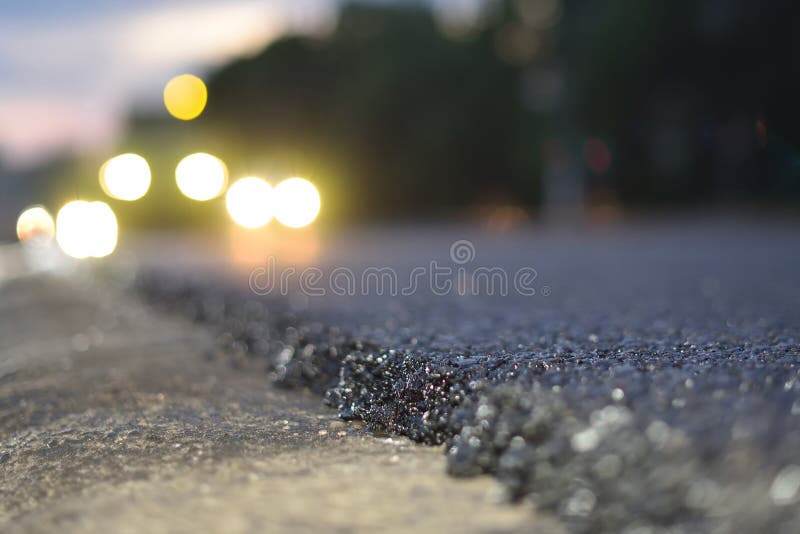 Road Repair and Thin Layer of New Asphalt Close-up Stock Image - Image ...