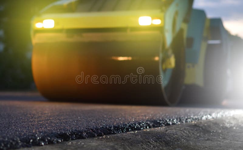 Road Repair, Thin Layer of New Asphalt Close-up and Road Roller Stock ...