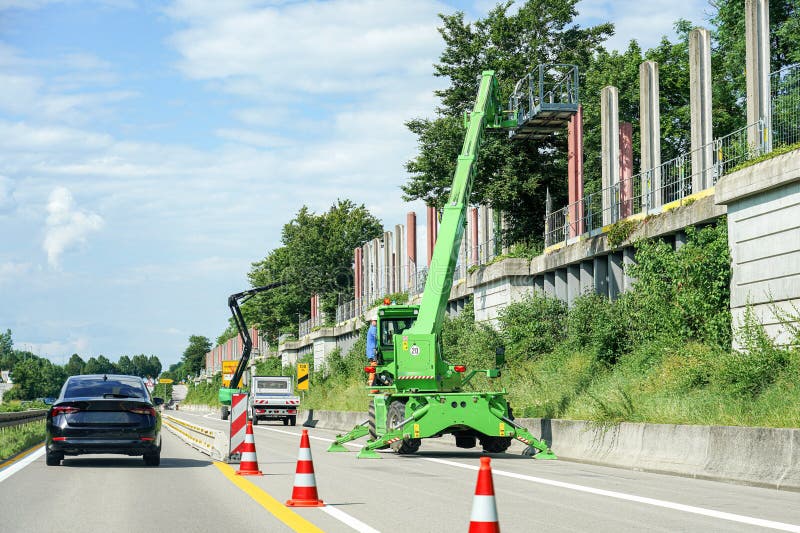 Road Repair Work with Special Equipment on the Highway Stock Image ...