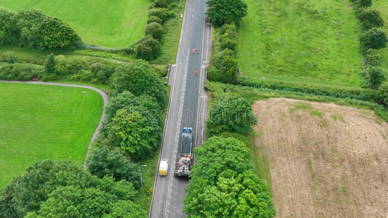Road Resurfacing by Surface Dressing Process Stock Video - Video of ...