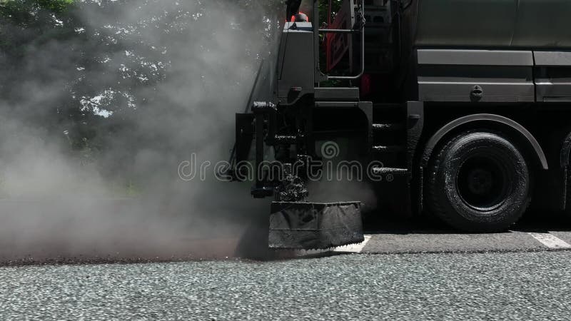 Road Resurfacing by Surface Dressing Process Stock Footage - Video of ...