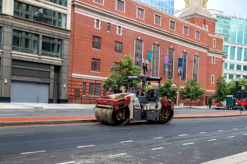 Road Roller and Asphalt Paving on a Road. Road Work in Downtown ...