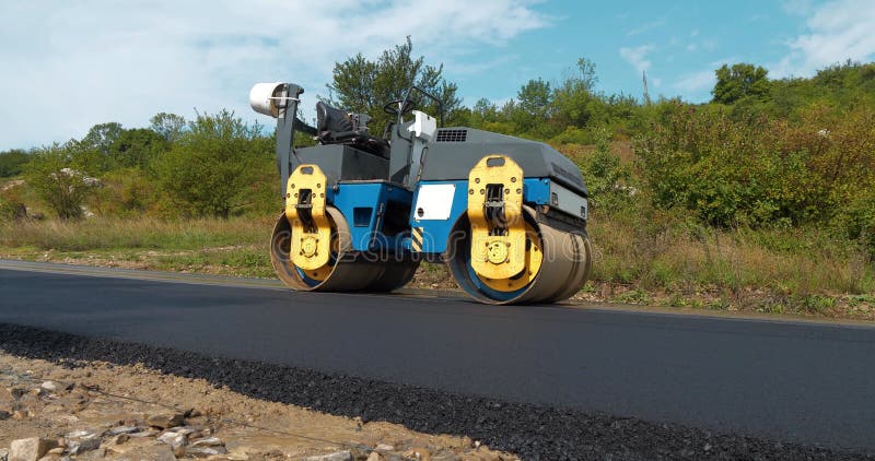 Road Roller Compacted Asphalt on New Road, Completed a Work Stock ...