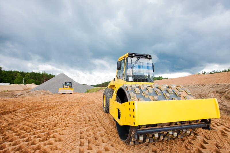 Road Roller Compacting Soil Stock Photo - Image of paver, asphalting ...