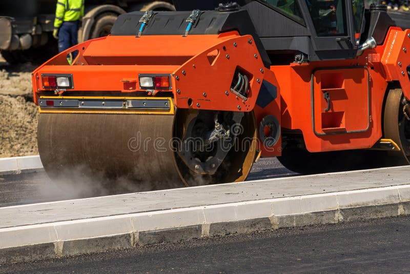 Road Roller Machine Working on Asphalt Road Maintenance Project Stock ...