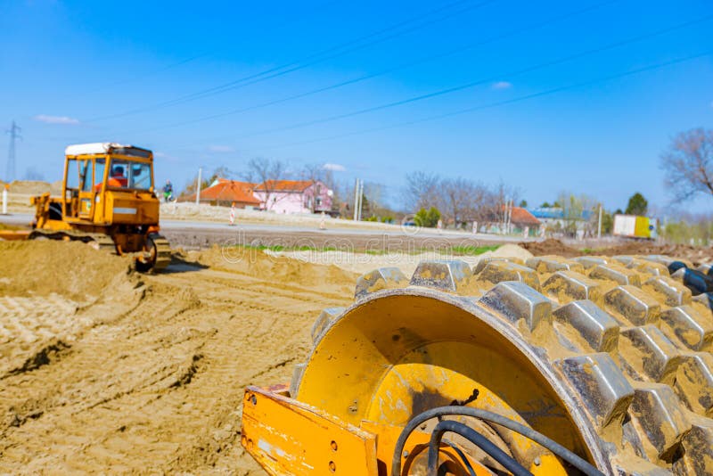 Road Roller with Spikes is Working at Construction Site Stock Photo ...