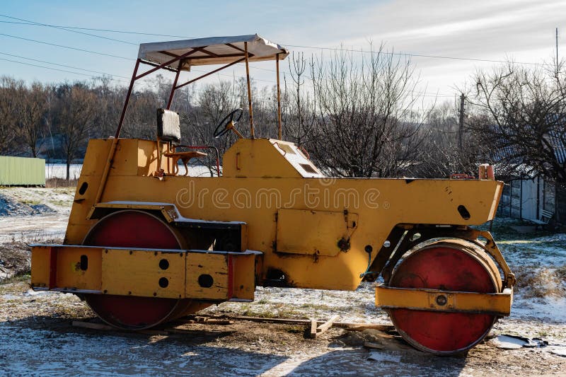 A Road Roller Standing on the Side of the Road Stock Image - Image of ...