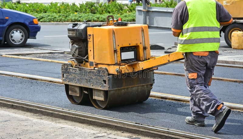 Road roller at work stock photo. Image of real, activity - 72991994