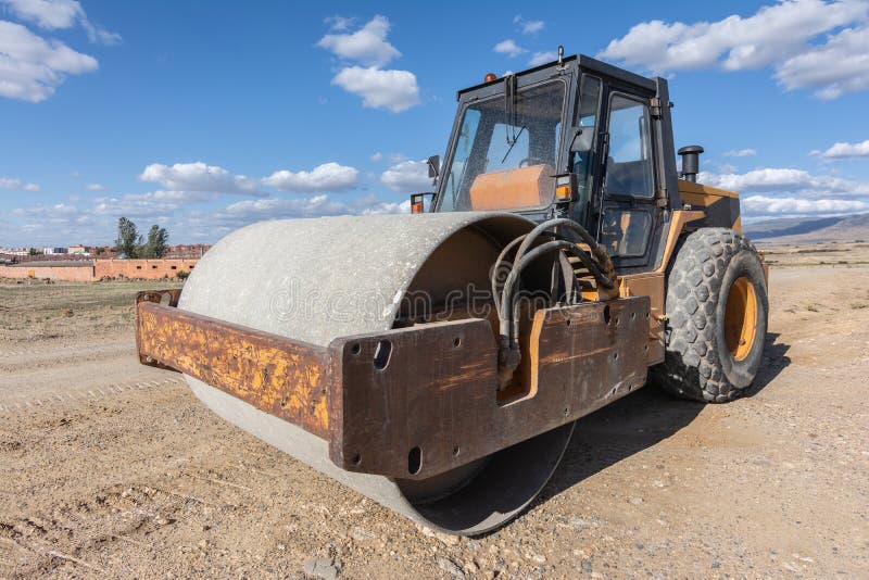 Road Roller Working on a Road Stock Photo - Image of orange, sand ...
