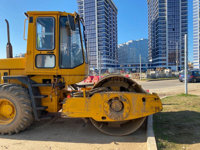 Road Roller Working at Construction Site during Asphalt Road Repair ...