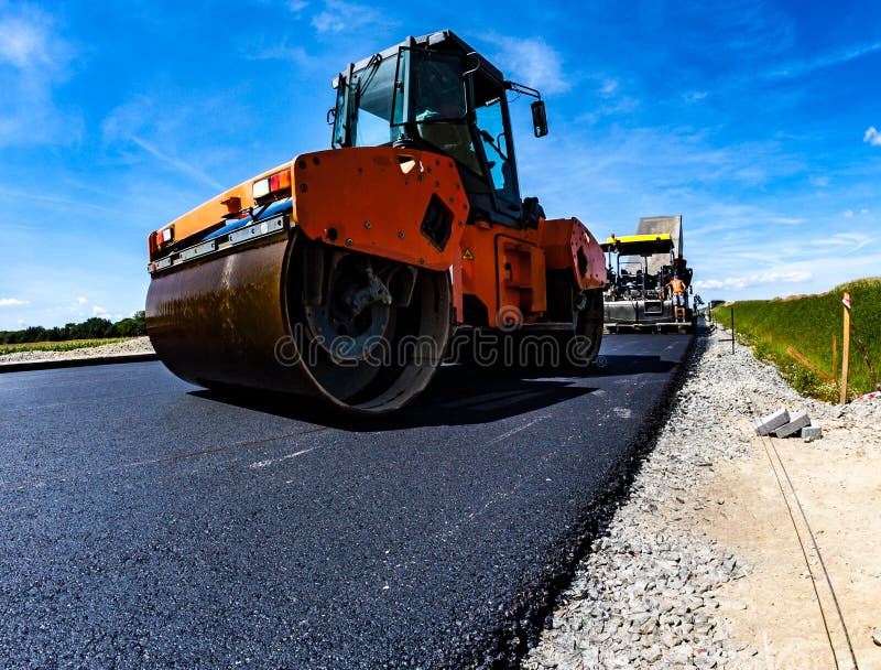 Road Roller Working on the Construction Site Stock Image - Image of ...