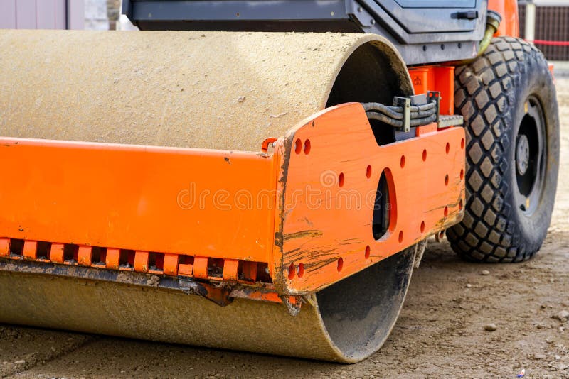 The Road Roller Works on the Construction Site of a New Building Stock ...