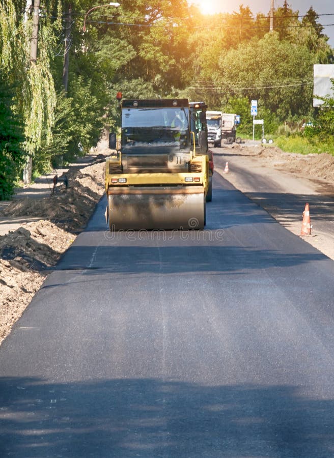 Road rollers at asphalt stock photo. Image of vibration - 99016594