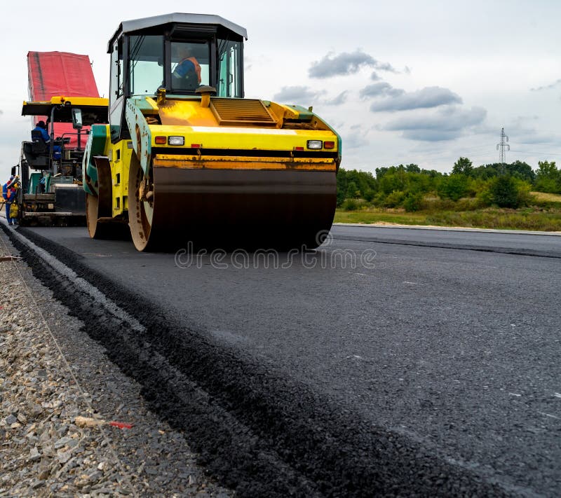 Road Rollers Working on the Construction Site Stock Image - Image of ...