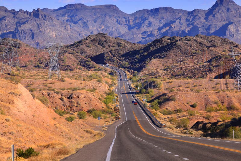 Road through Rugged Terrain Stock Photo - Image of outdoors, sandstone ...