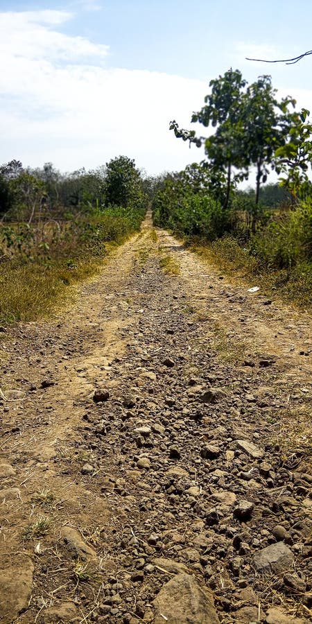 Road from sand and stone stock image. Image of country - 152193517