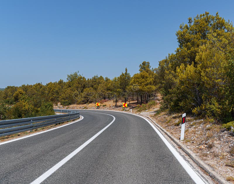 A Road with Sharp Turns in the Mountains. Stock Image - Image of green ...