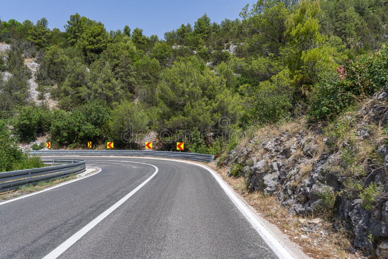 A Road with Sharp Turns in the Mountains. Stock Image - Image of ...