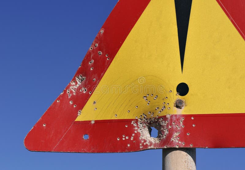 Road Sign with Bullet Holes Stock Image - Image of hole, vandalism ...