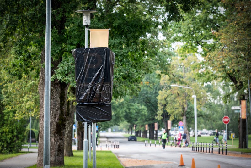 Road Sign Covered Garbage Bag Stock Photos - Free & Royalty-Free Stock ...