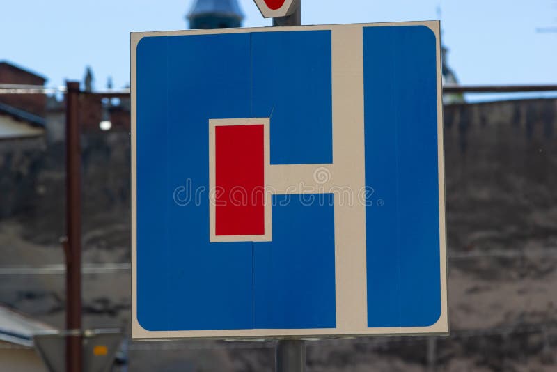 Road Sign Exit To a Dead End. Blue Road Sign on a Wooden Post in a ...