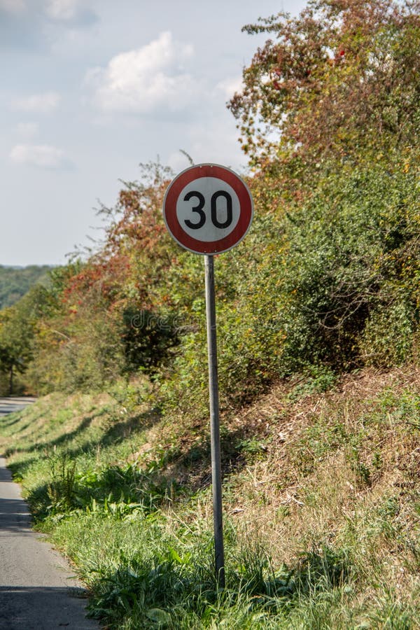 Road Sign at 30 Km / H Along the Way Stock Photo - Image of sign, metal ...