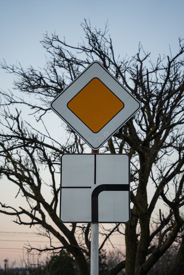 Road Sign the Main Road Changes Direction Stock Photo - Image of ...