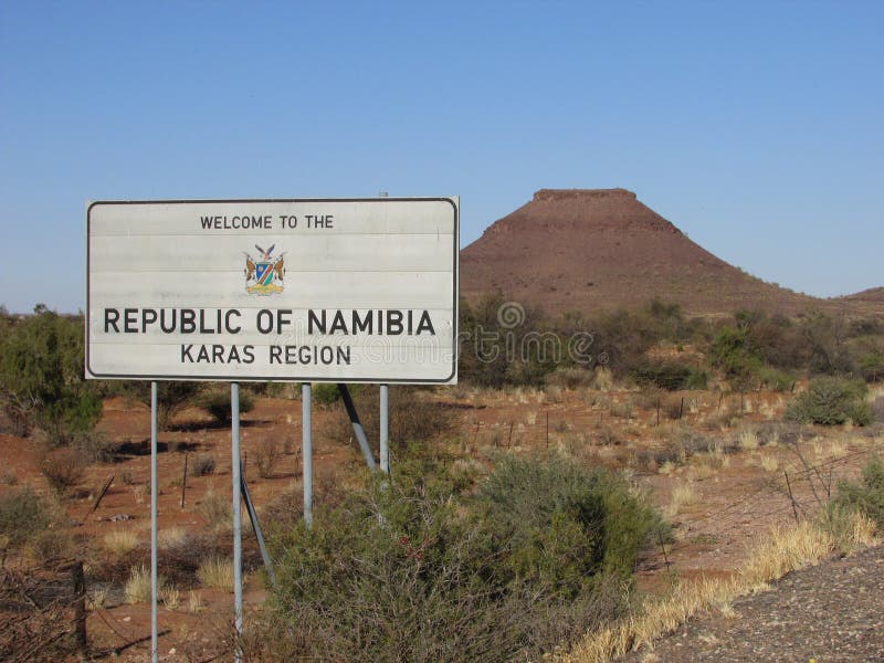 Road Sign at Namibian Border Welcoming Travelers To Namibia with Red ...