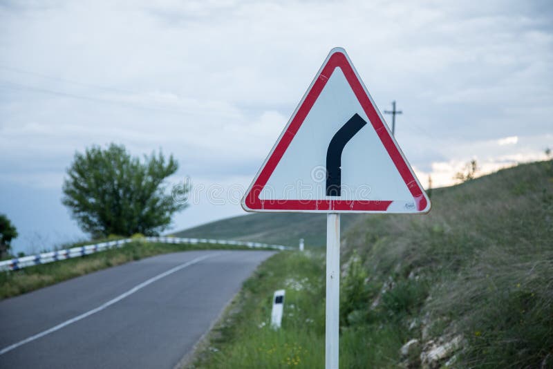 Road sign next to the road stock image. Image of percent - 219802431