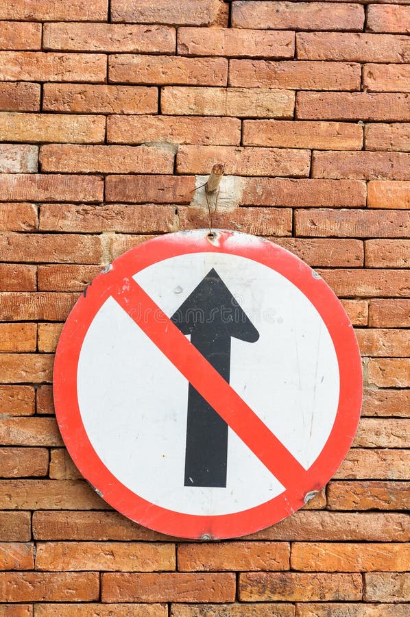 Road Sign No Go Ahead the Way on Red Brick Wall. Stock Image - Image of ...