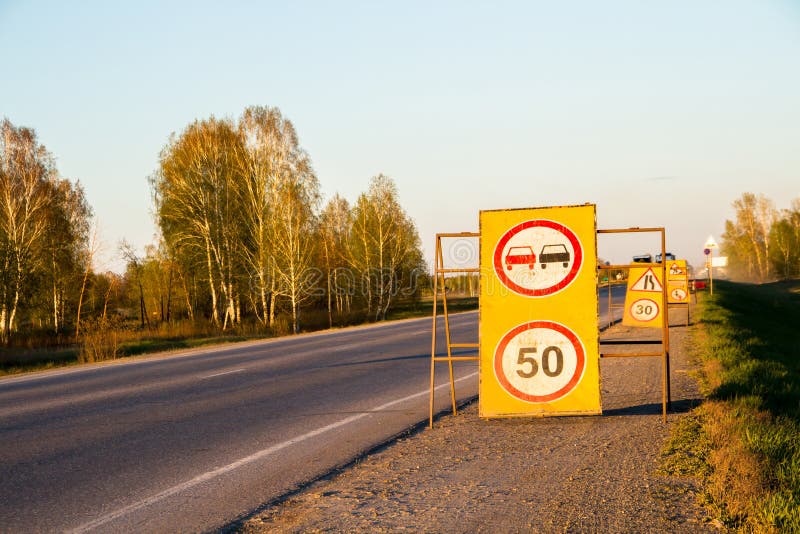 Road with Sign Pole and Blue Sky with Clouds Stock Photo - Image of ...