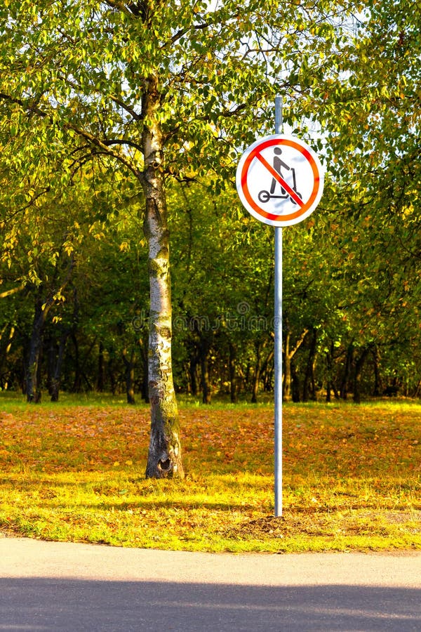 Road Sign Prohibiting Riding a Scooter in the Park. Stock Image - Image ...