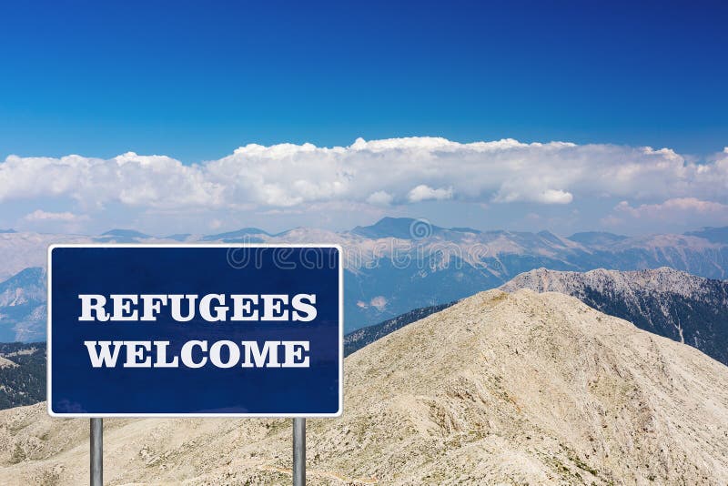 The Road Sign with Refugees Welcome Sign Stock Image - Image of ...