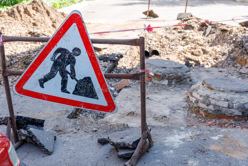 Tar Pits Sign Pointing To Leaking Tar Pit in Green Grass Stock Photo ...