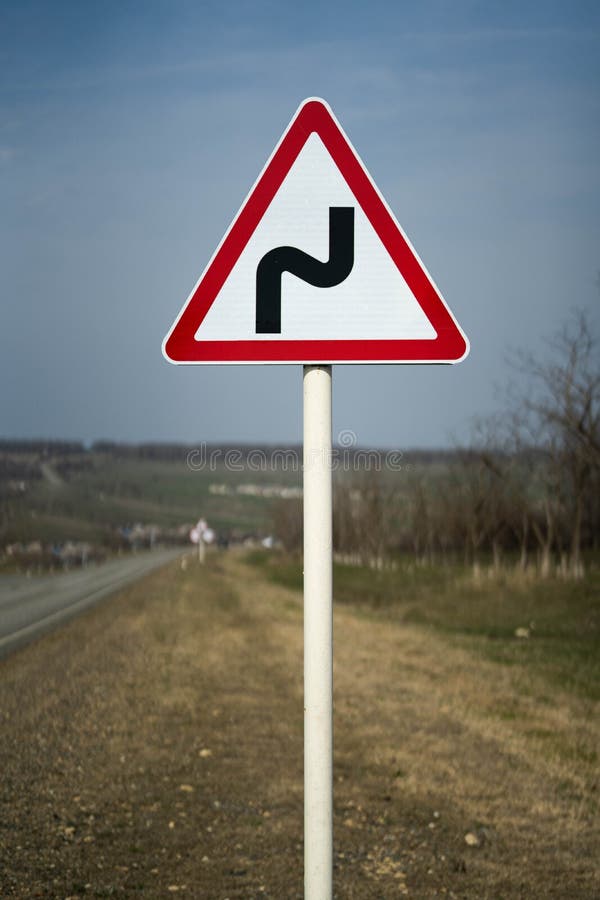 Road Sign Serpentine. Dangerous Turn Stock Image - Image of street ...