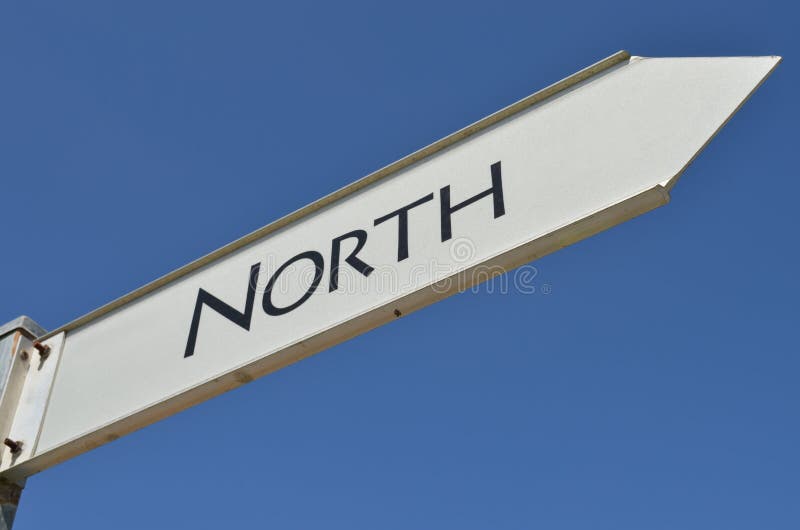 Road sign showing north stock photo. Image of snow, road - 62372222
