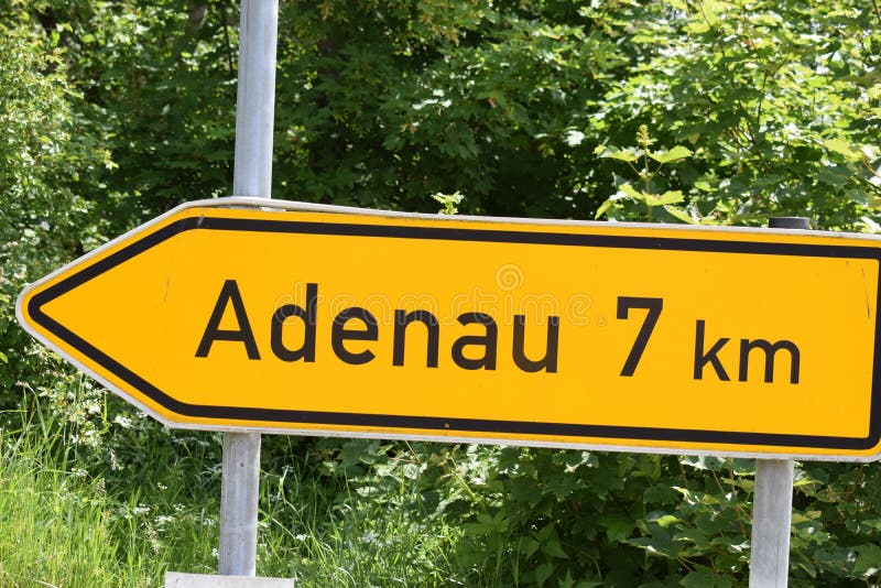 Road sign to Adenau stock photo. Image of plant, road - 234286784