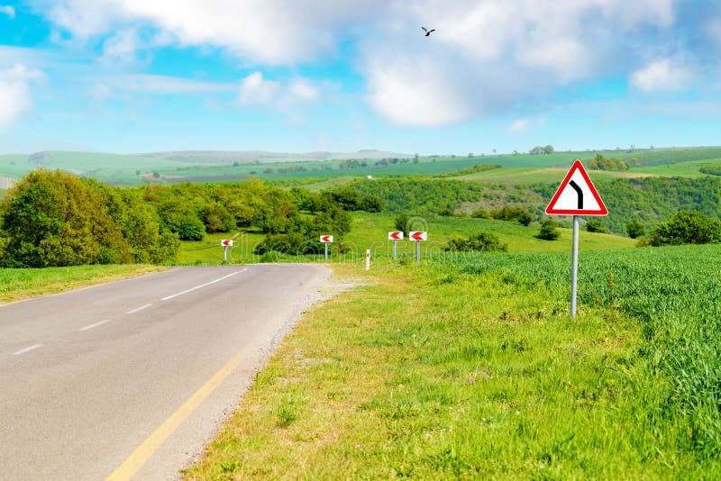 Road Sign Turn on the Highway Stock Photo - Image of field, information ...