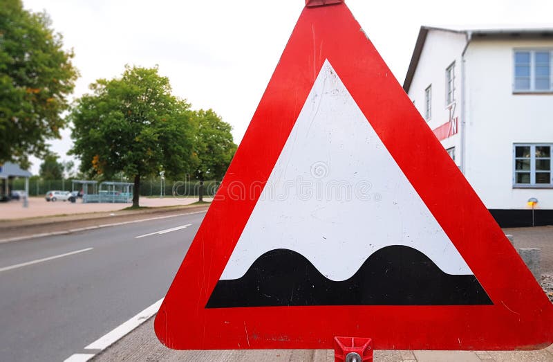 Road Sign Warning of a Bumpy Road Stock Illustration - Illustration of ...