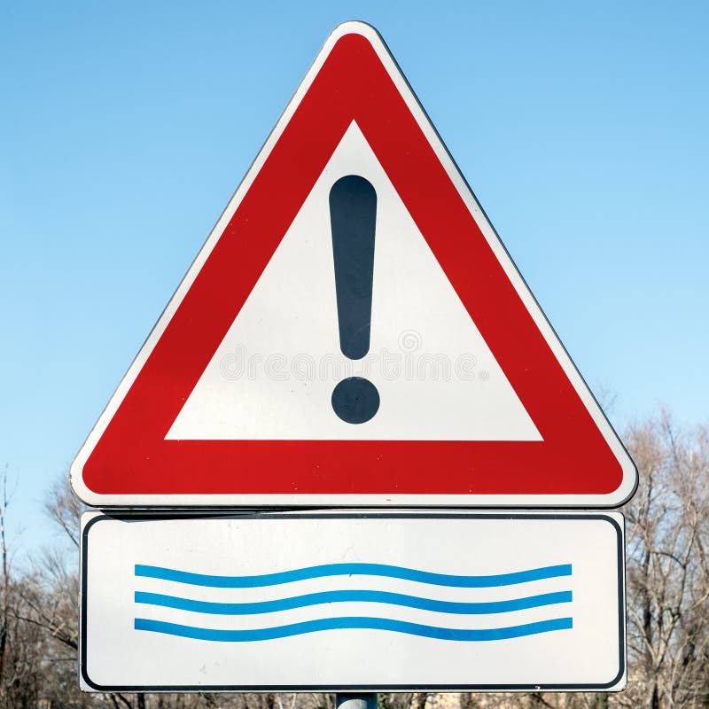The Road Sign Warning of the Danger of River Water Flood Stock Photo ...