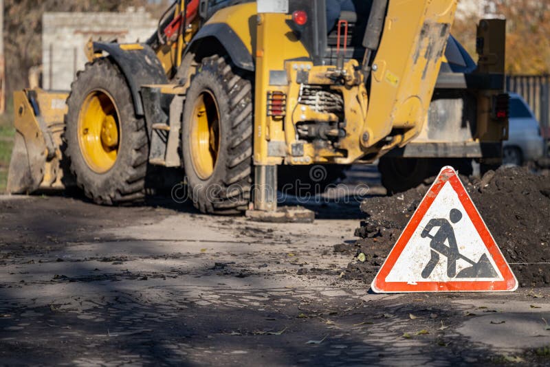 Road Sign Warning about Work on the Road Stock Photo - Image of tractor ...
