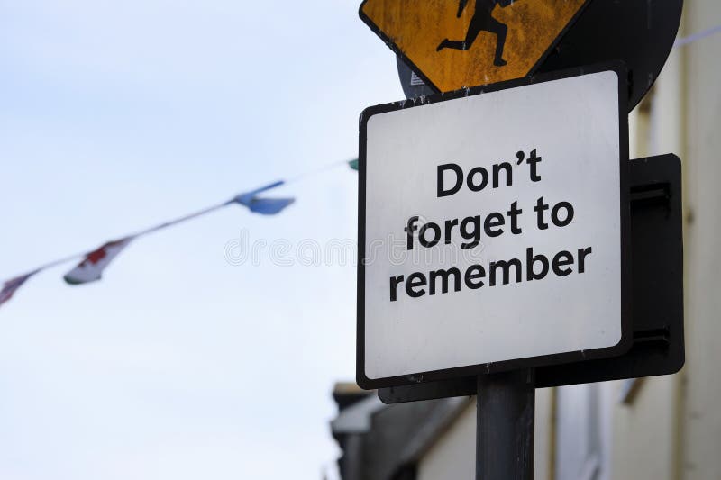 Road Sign with the Words "Don T Forget To Remember" on it Stock Photo ...