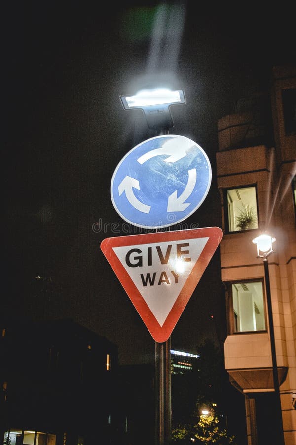 Road Signage at Night stock photo. Image of font, road - 267076622