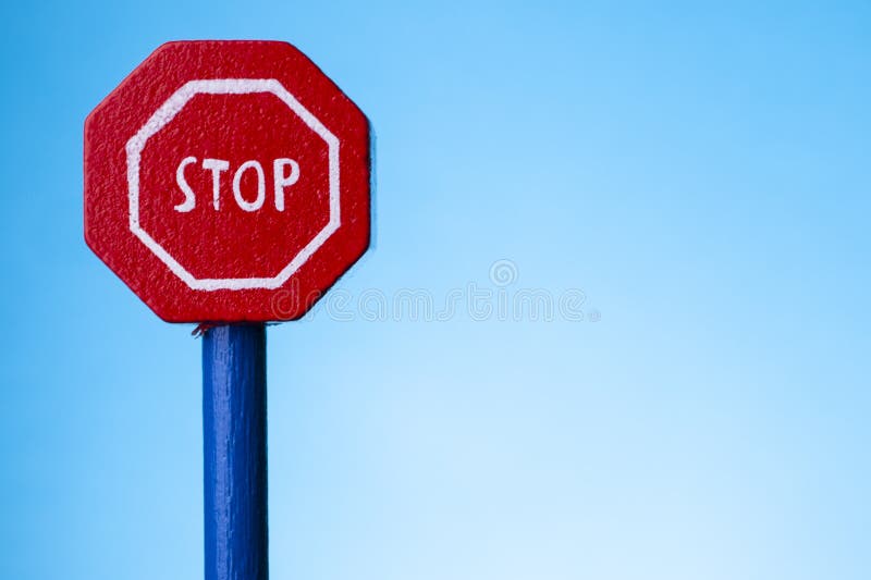 Road Signal STOP - Isolated on Blue Stock Photo - Image of close ...