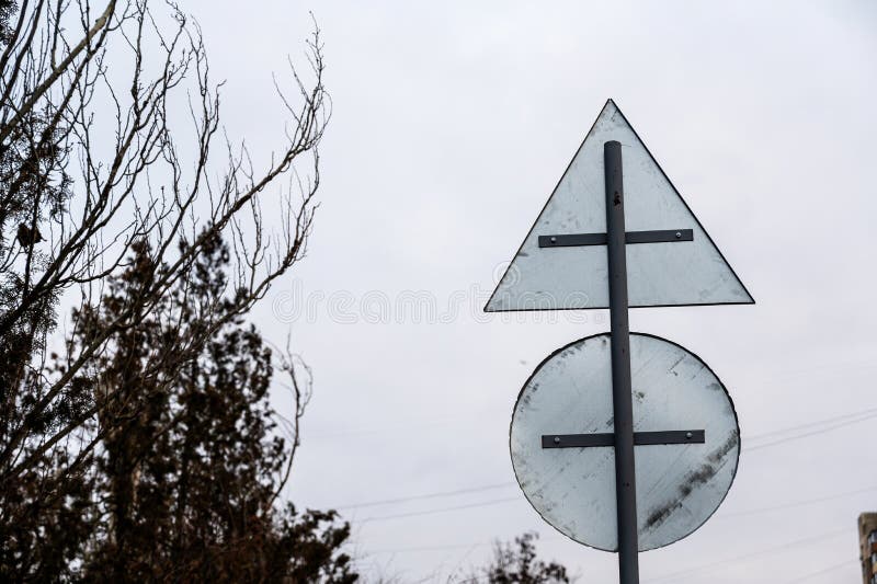 Road Signs, Backside. Circular and Triangular Sign Opposite Overcast ...
