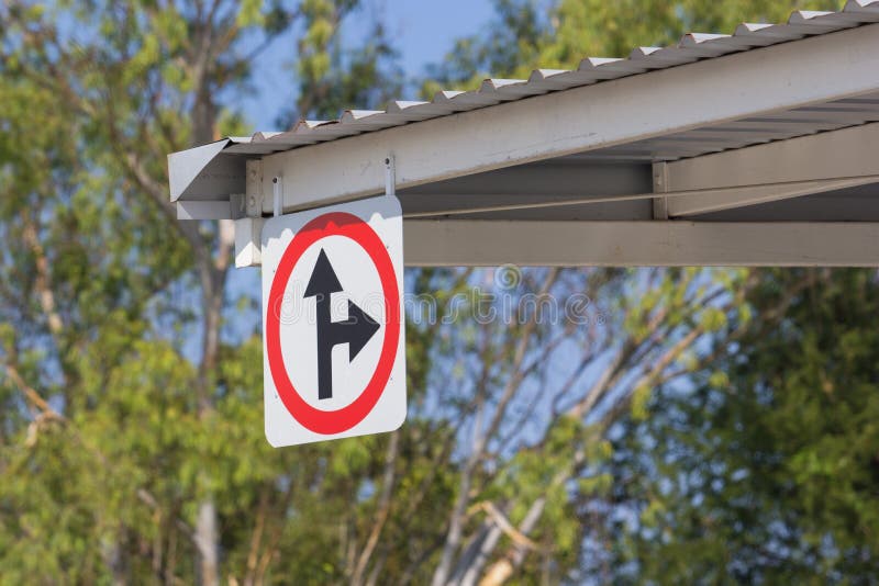 Road signs on roof stock photo. Image of roof, tree - 136669640